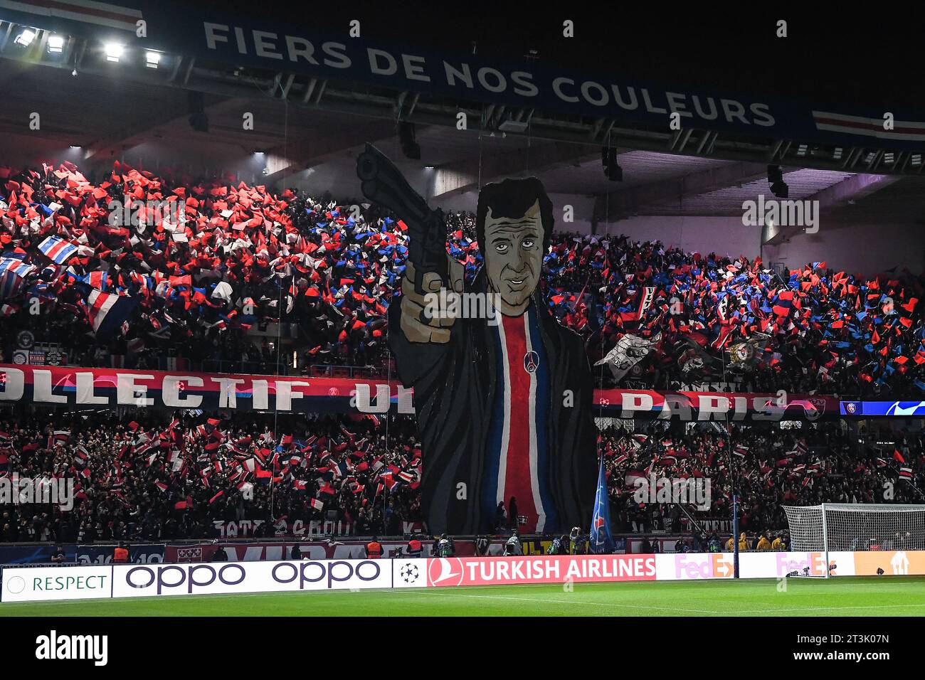 Paris, France. 25th Oct, 2023. PSG supporters deploy a giant tifo representing French actor Jean ...