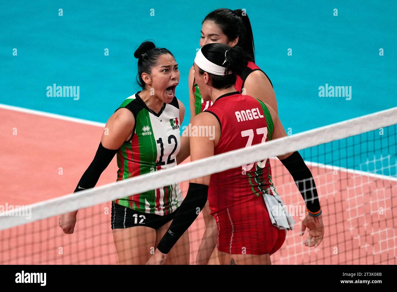 Mexico's Joseline Landeros, left, celebrates a point with teammate ...
