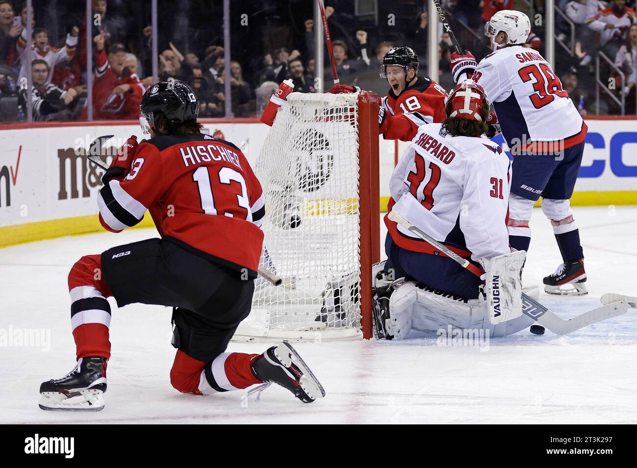 New Jersey Devils center Nico Hischier celebrates his goal past ...