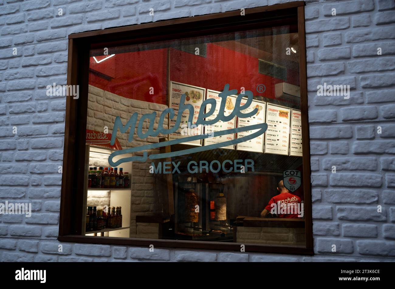 Window into a mexican grill named machete in the city of sofia ...