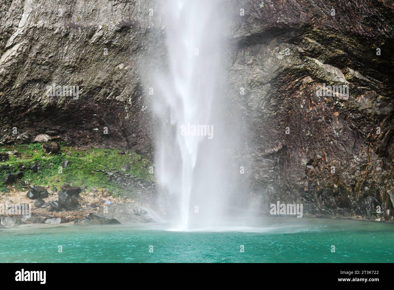 Photo of a waterfall falling into a lake, Zhejiang Province, China ...