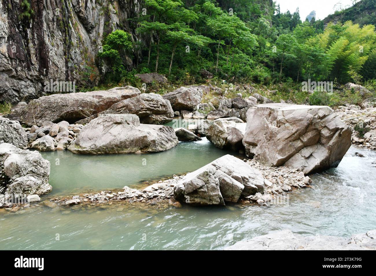 Photo of rocks in streams in the valley Stock Photo - Alamy