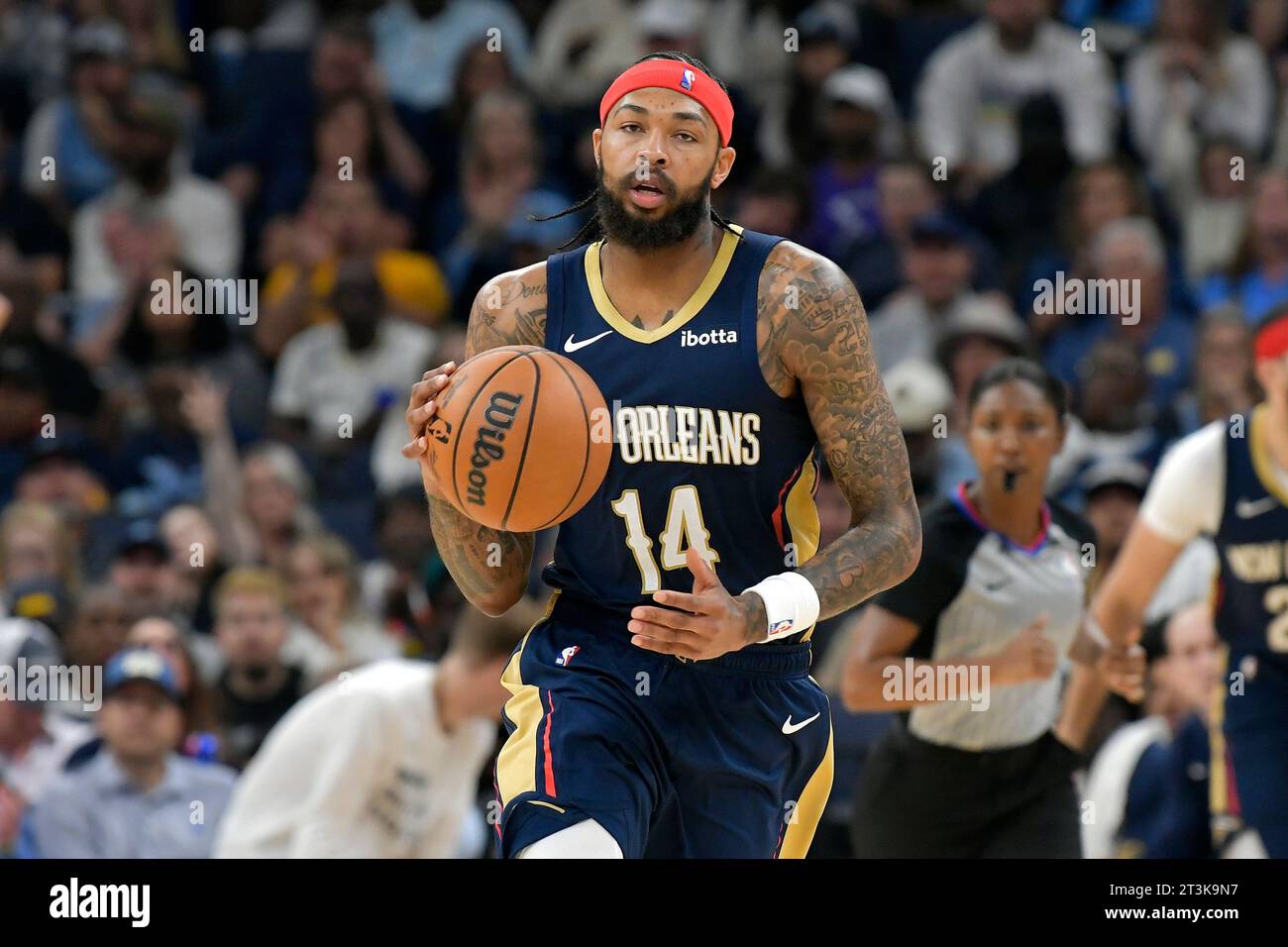 New Orleans Pelicans forward Brandon Ingram (14) brings the ball up ...