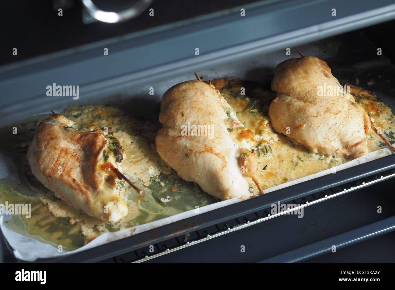 Slice chicken baked in oven hi-res stock photography and images - Alamy