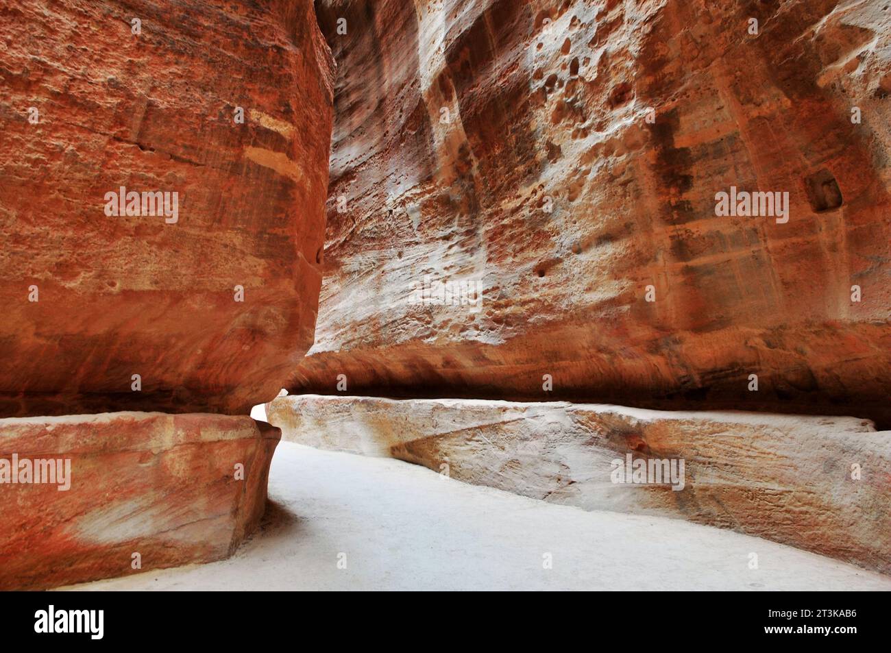 The ruins ancient path between cliffs in Petra, Jordan Stock Photo - Alamy