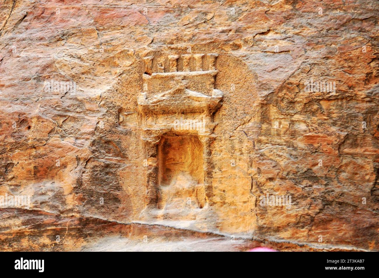 Ancient carvings on rocks in Petra, Jordan Stock Photo - Alamy