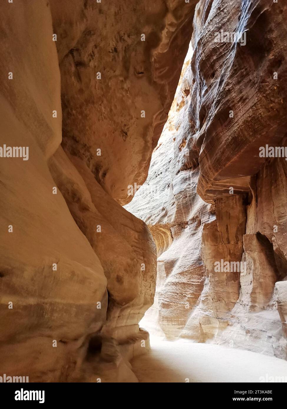 The ruins ancient path between cliffs in Petra, Jordan Stock Photo - Alamy