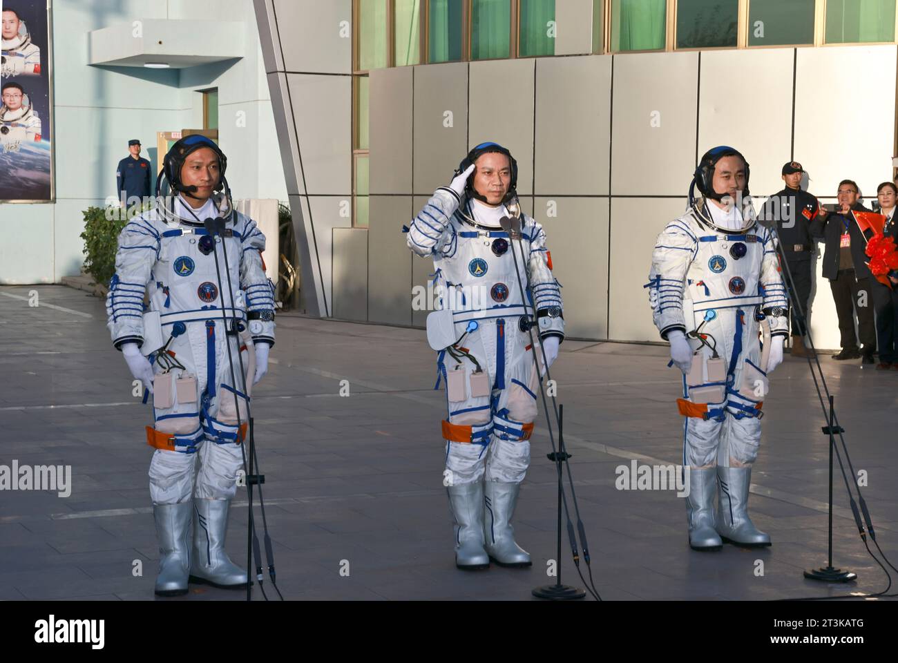 Jiuquan. 26th Oct, 2023. Chinese astronauts Tang Hongbo (C), Tang ...