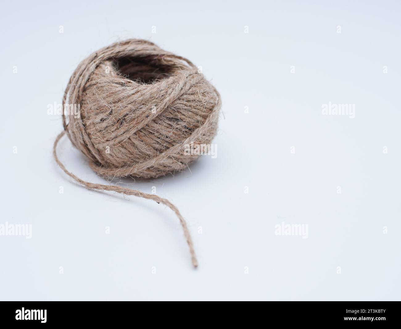 roll of hemp rope isolated on white background Stock Photo - Alamy