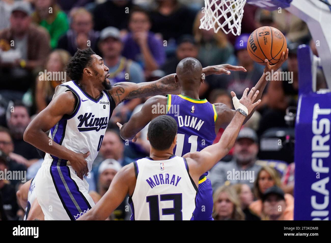 Sacramento Kings' Malik Monk (0) and Keegan Murray (13) defend against ...