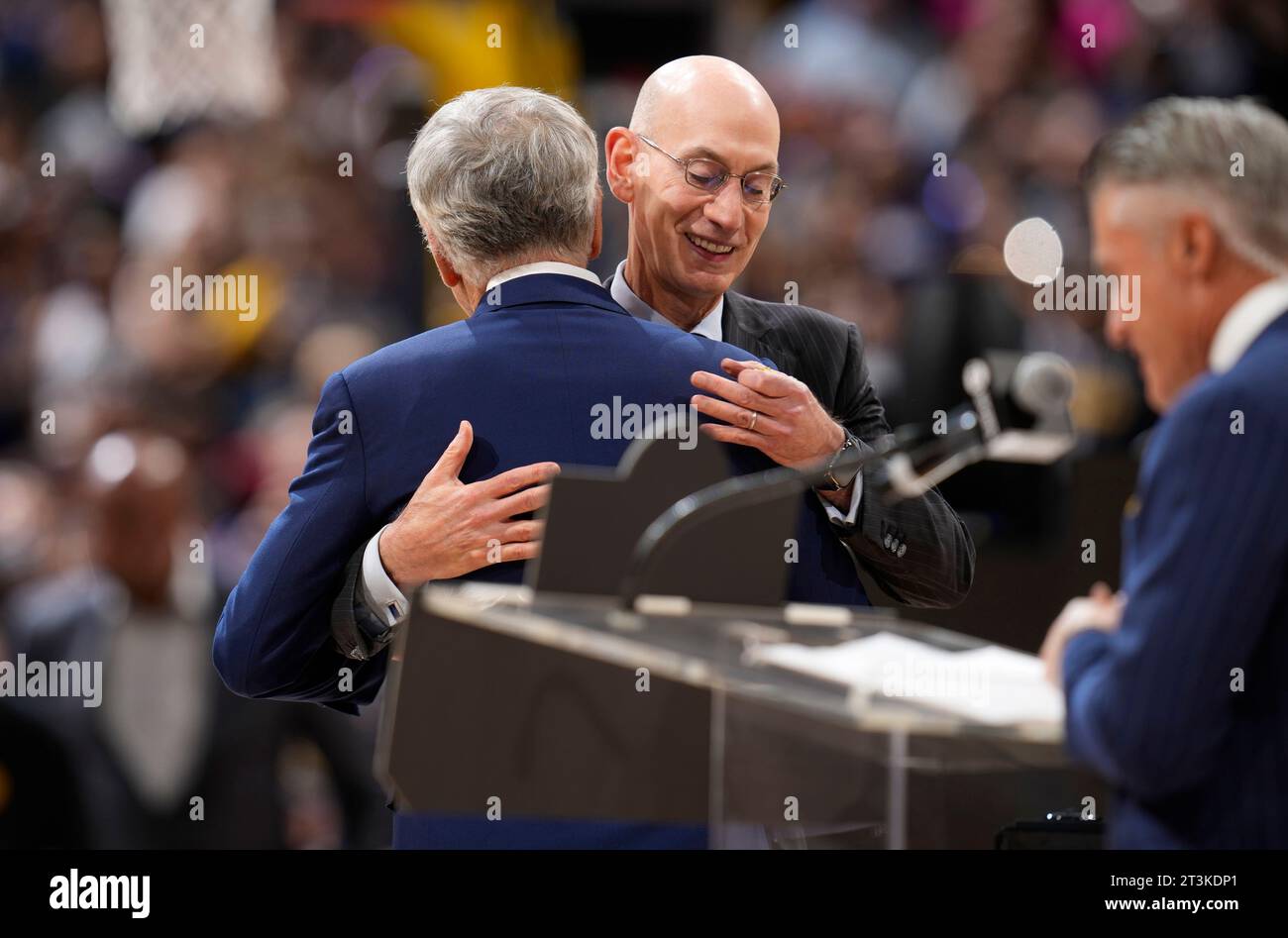 NBA Commissioner Adam Silver hugs Denver Nuggets owner E. Stanley ...