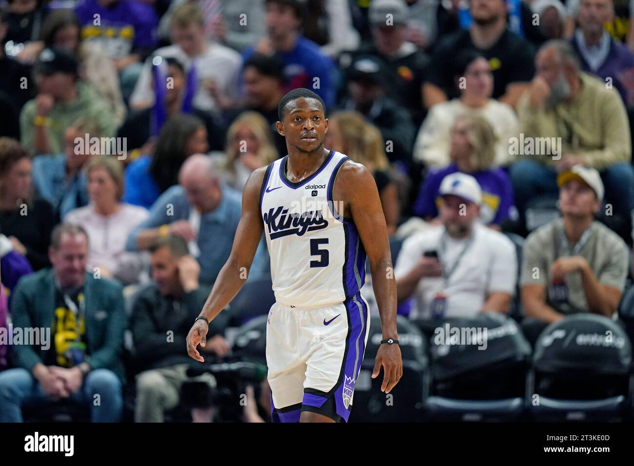 Sacramento Kings guard De'Aaron Fox walks on the court after scoring ...