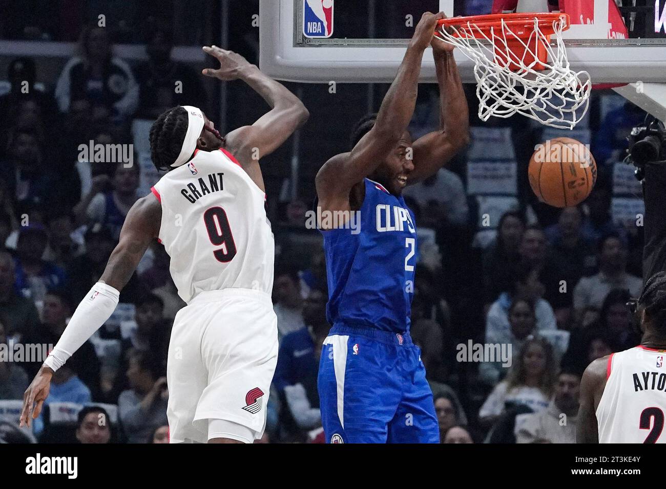 Los Angeles Clippers forward Kawhi Leonard, right, dunks as Portland ...