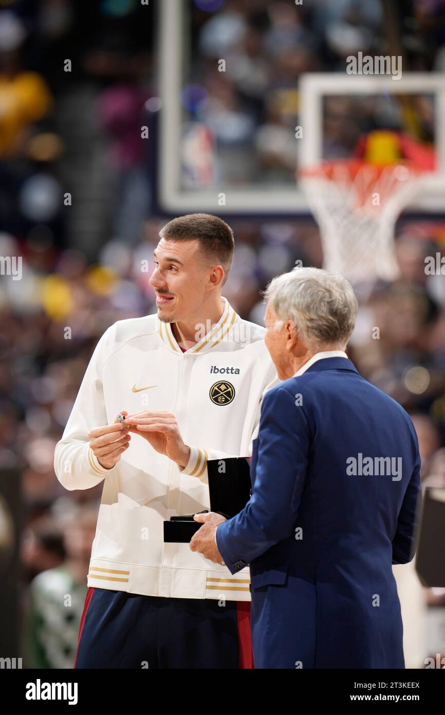 Denver Nuggets forward Vlatko Cancar (31) shows off his NBA ...