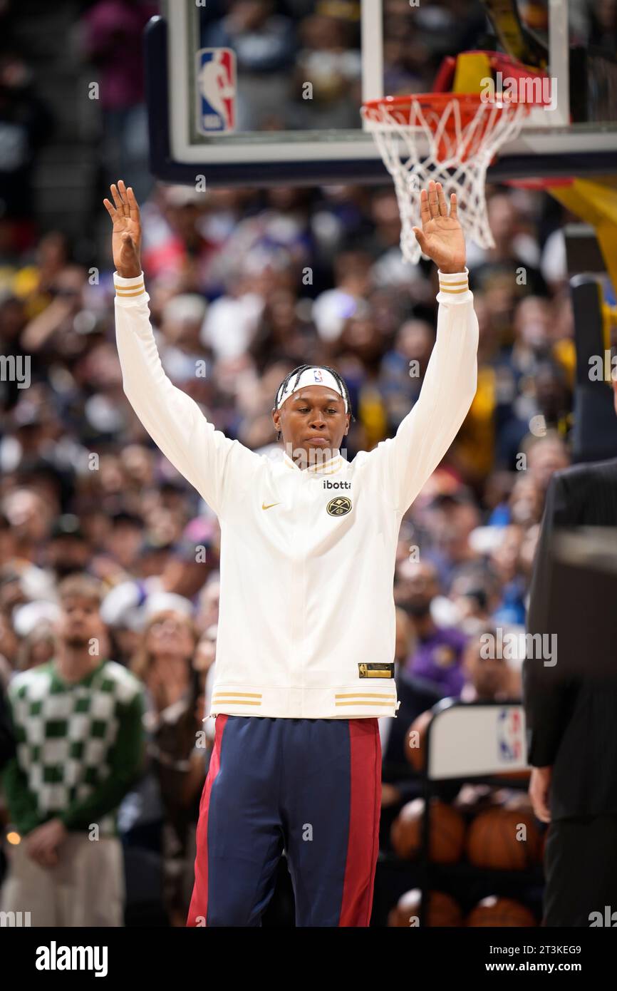 Denver Nuggets forward Peyton Watson (8) heads out to receive his NBA ...
