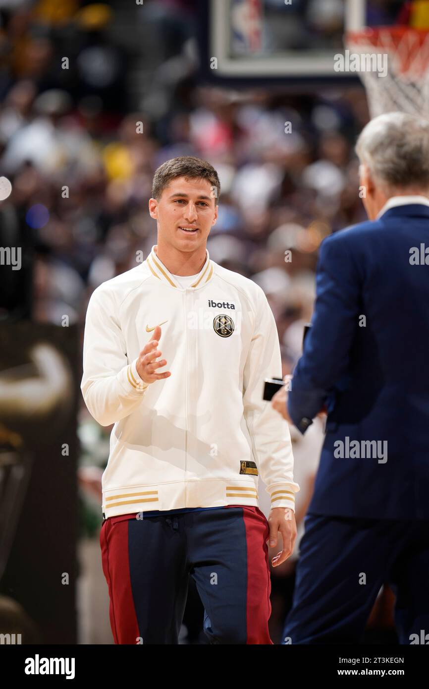 Denver Nuggets guard Collin Gillespie (21) steps up to receive his NBA ...