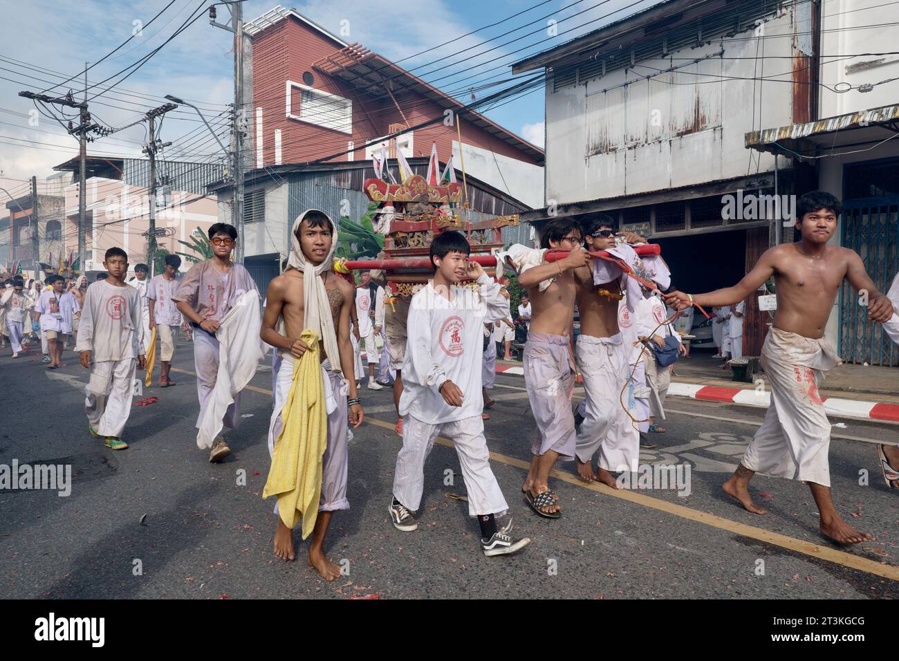 Palanquin bearers in a procession during the Vegetarian Festival (Nine ...