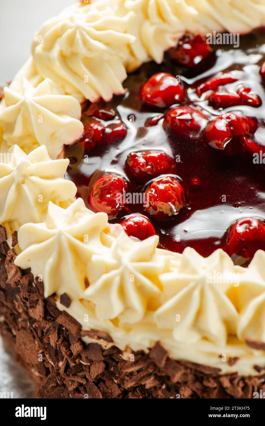 Black forest gateaux cake with a chocolate sponge, cherry compote, and ...