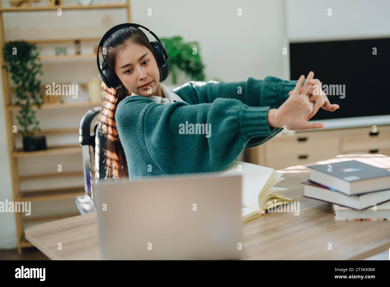 Studying online, beautiful Asian female student show symptoms burnout ...