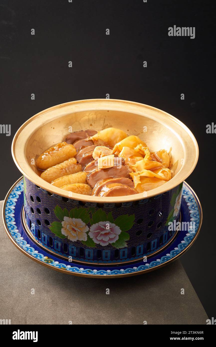 Braised Abalone, Sea Cucumber and Sliced Sea Whelk in Abalone Sauce ...