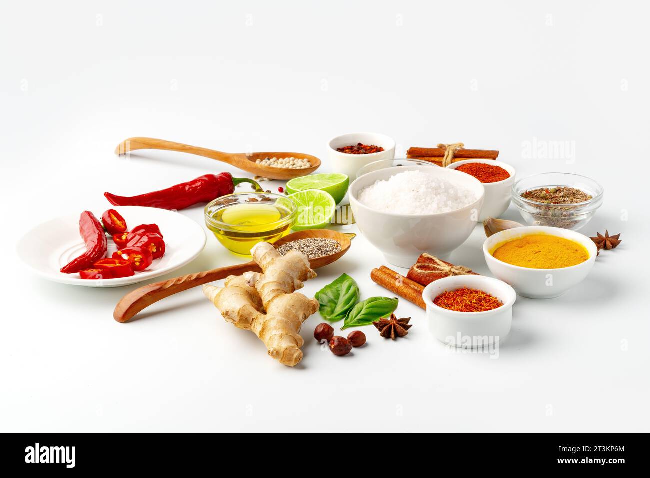Ginger root and various spices on white background Stock Photo - Alamy