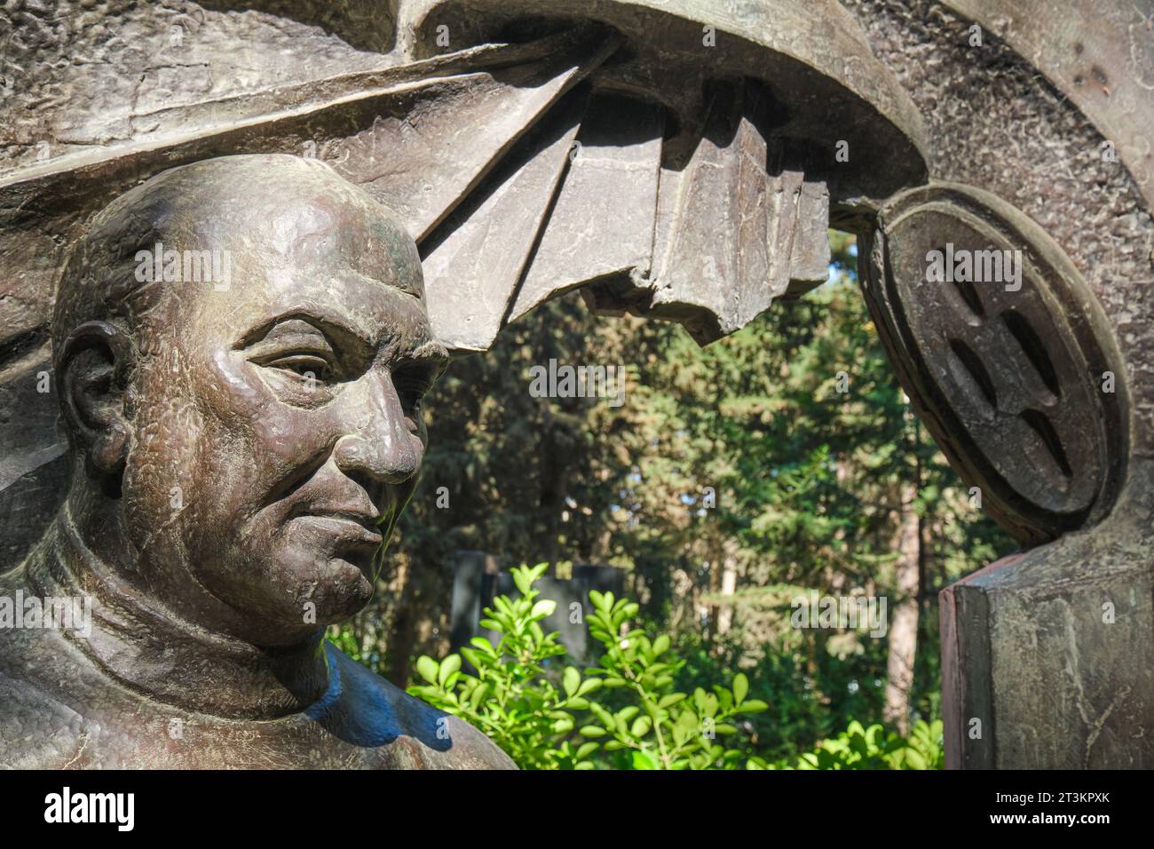 One of the gravesites and statues of a famous scientist in the park. At ...