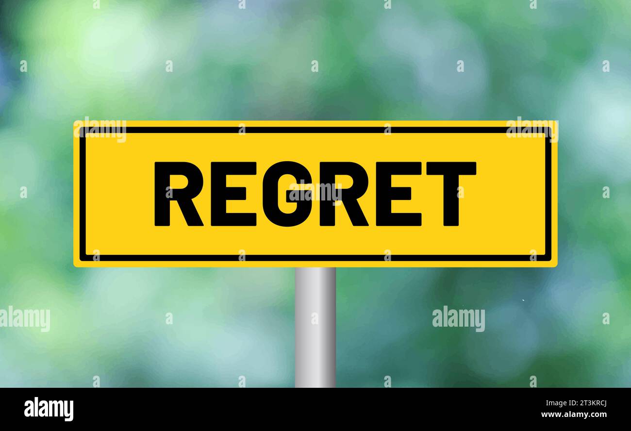 Regret road sign on blur background Stock Photo - Alamy