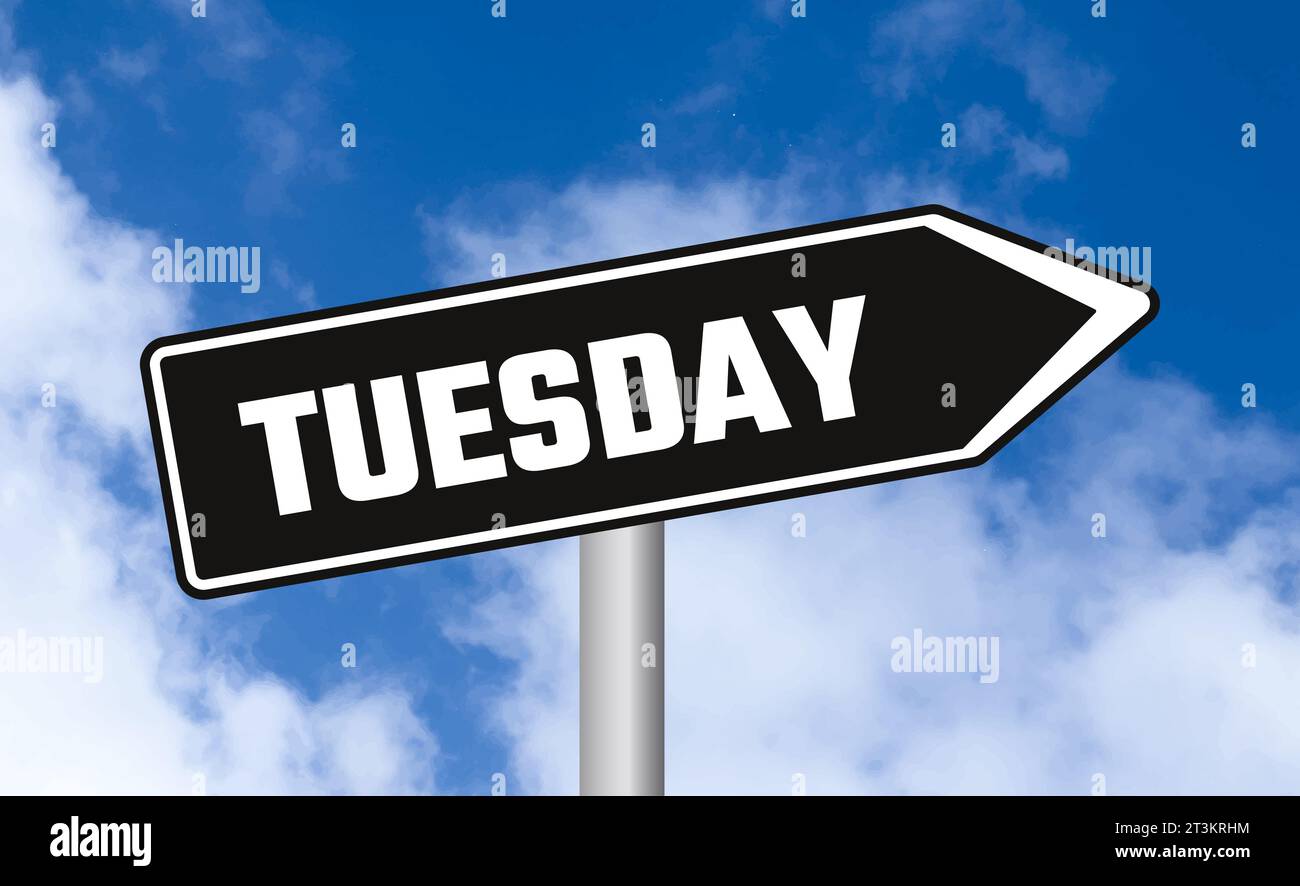 Tuesday road sign on blue sky background Stock Photo - Alamy
