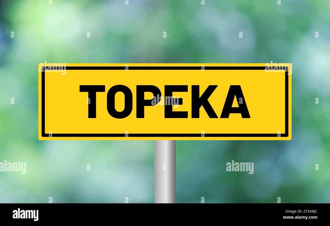 Topeka road sign on blur background Stock Photo - Alamy
