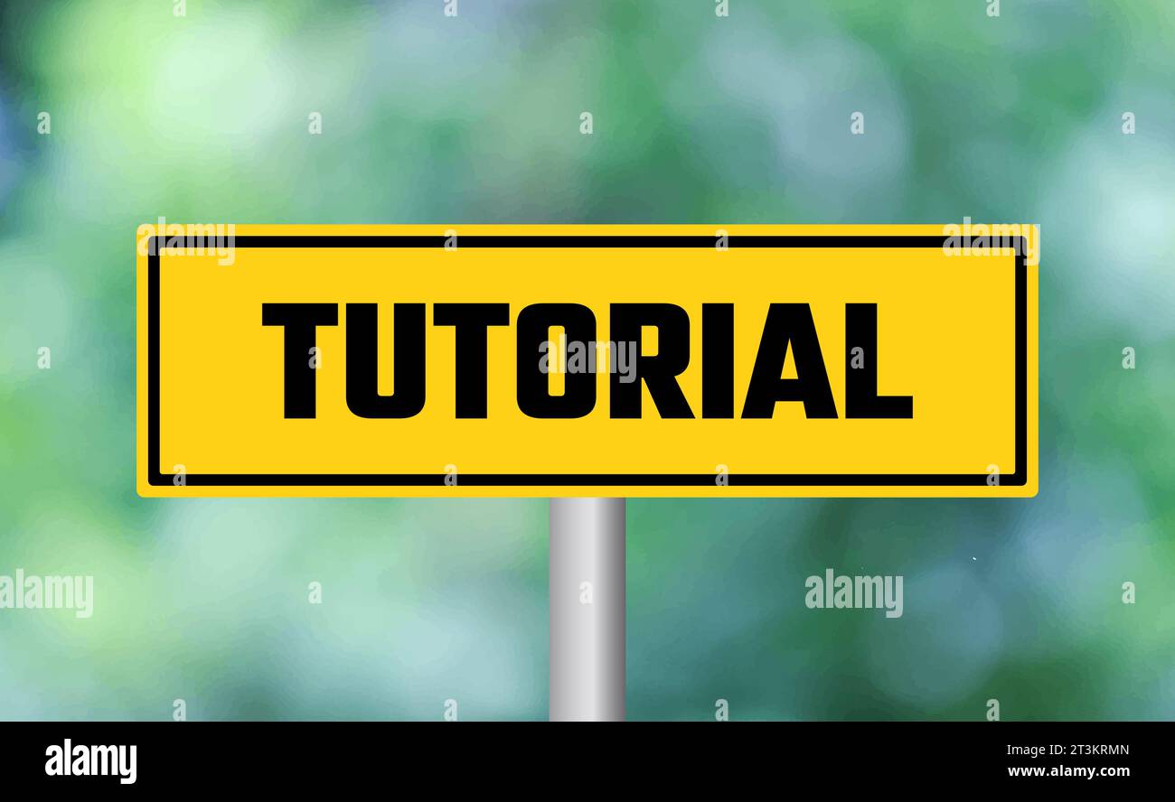 Tutorial road sign on blur background Stock Photo - Alamy