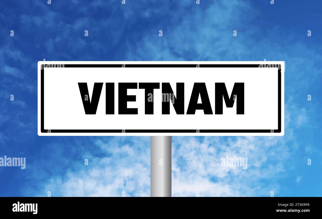 Vietnam road sign on blue sky background Stock Photo - Alamy