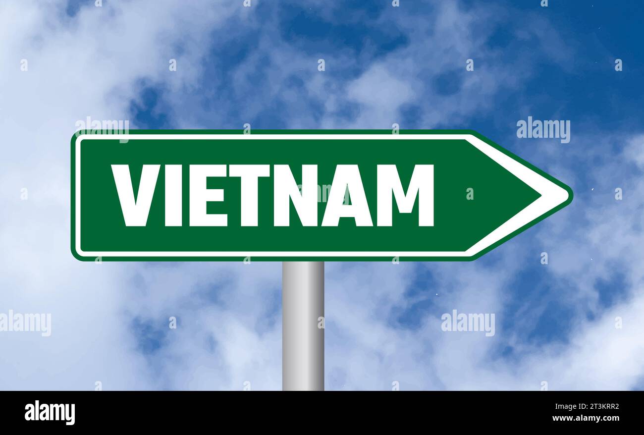 Vietnam road sign on blue sky background Stock Photo - Alamy