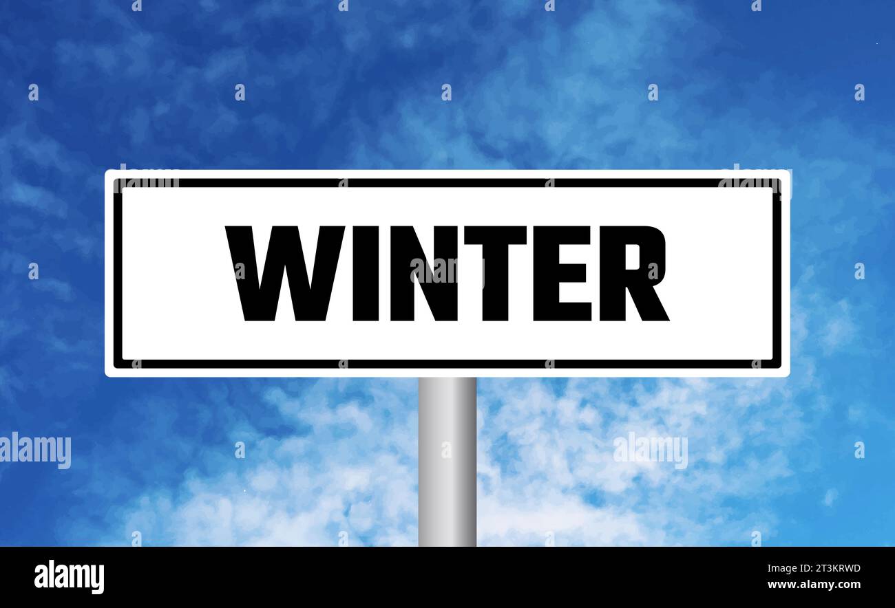 Winter road sign on sky background Stock Photo - Alamy