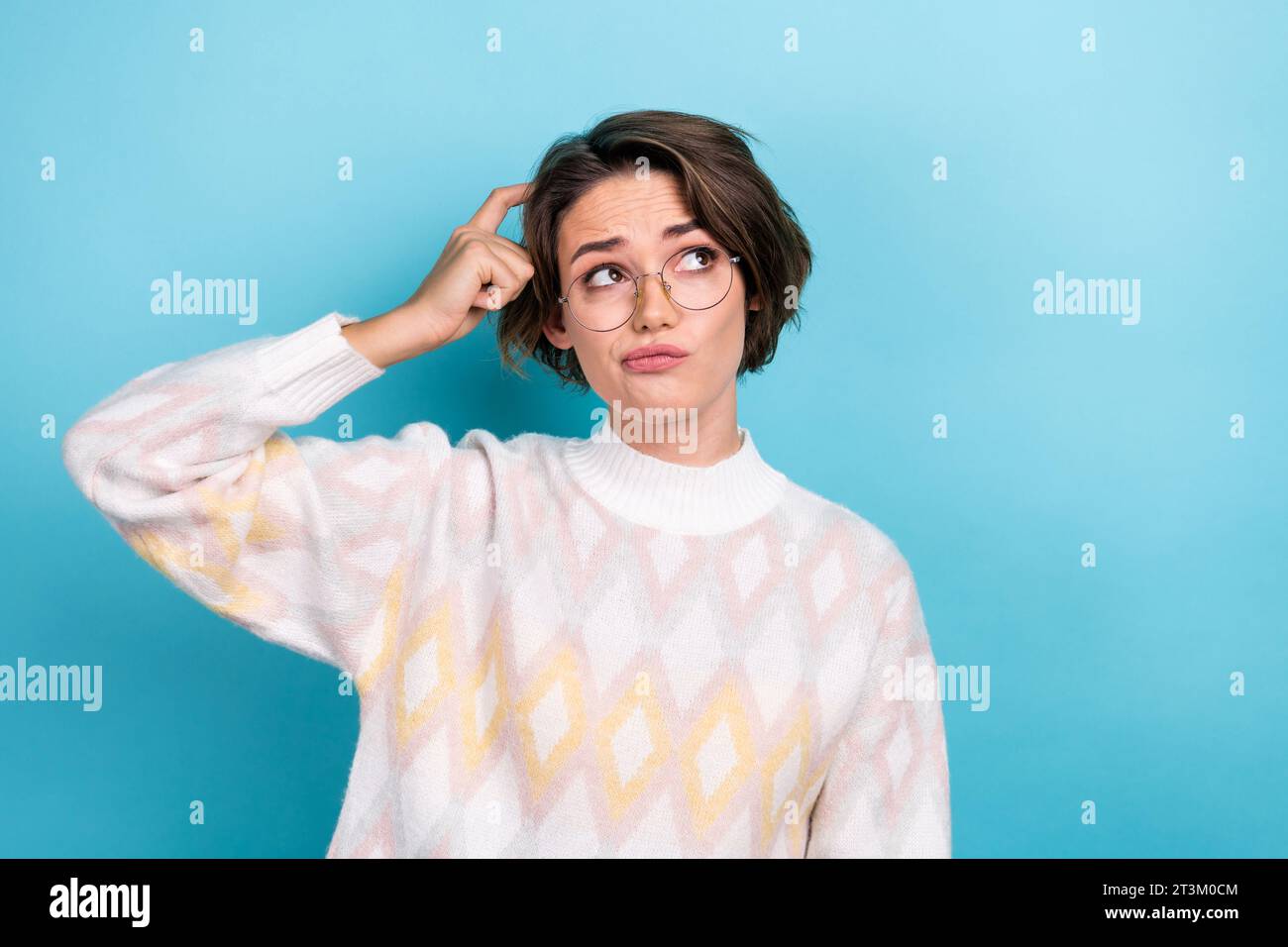 Photo portrait of pretty young girl scratch head confused look empty ...