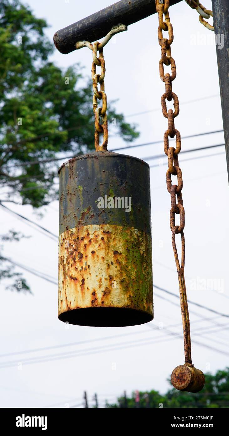 The rusty bell is made of iron with peeling paint and a scratch Stock ...