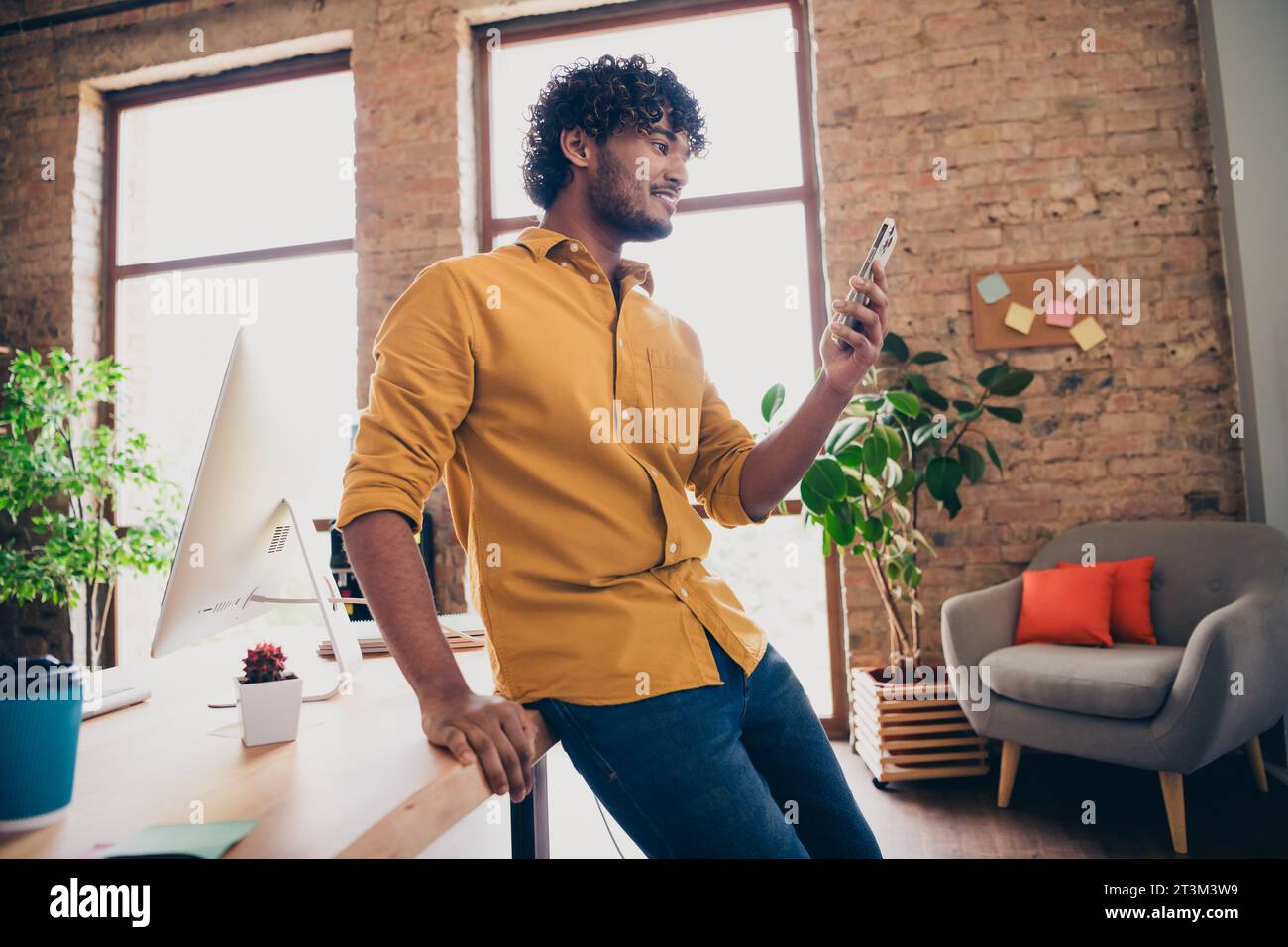 Photo of positive nice man boss ceo dressed trendy clothes reading cv ...