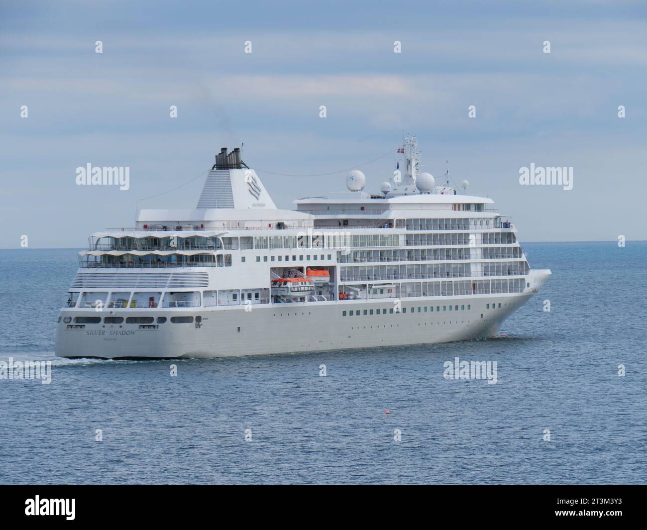 A white cruise ship sailing off the English coast near Falmouth England ...