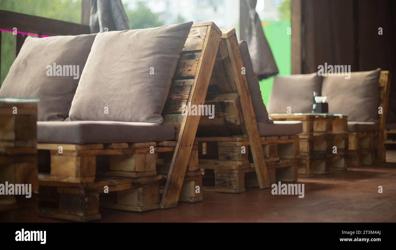 Soft sitting in restaurant. Comfortable seating for guests. Craft ...