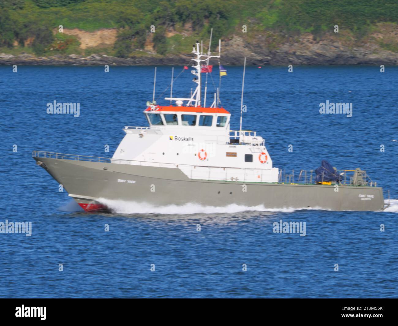 English coastguard ship sailing off the coast of Roseland peninsula ...
