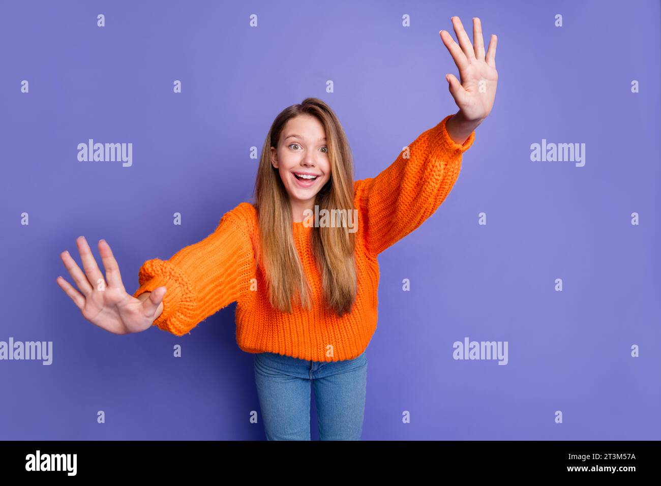 Photo of overjoyed positive person good mood raise hands palms waving ...