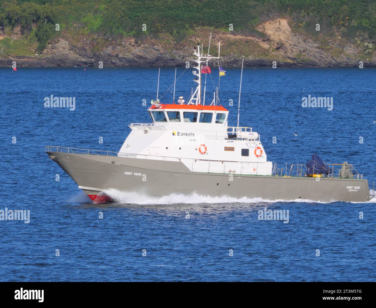 English coastguard ship sailing off the coast of Roseland peninsula ...