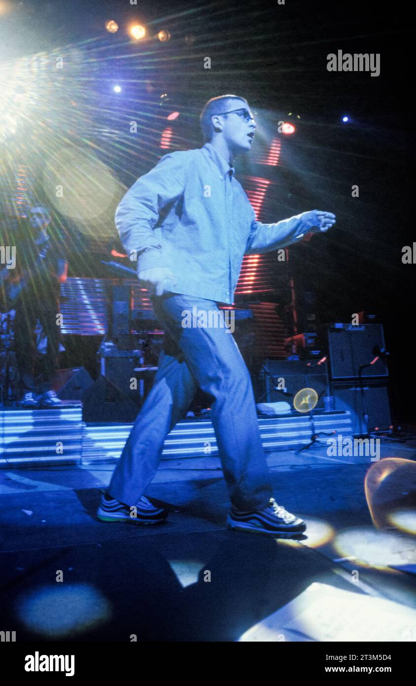 ROBBIE WILLIAMS, SINGER, FIRST TOUR, 1997: Robbie Williams playing live ...