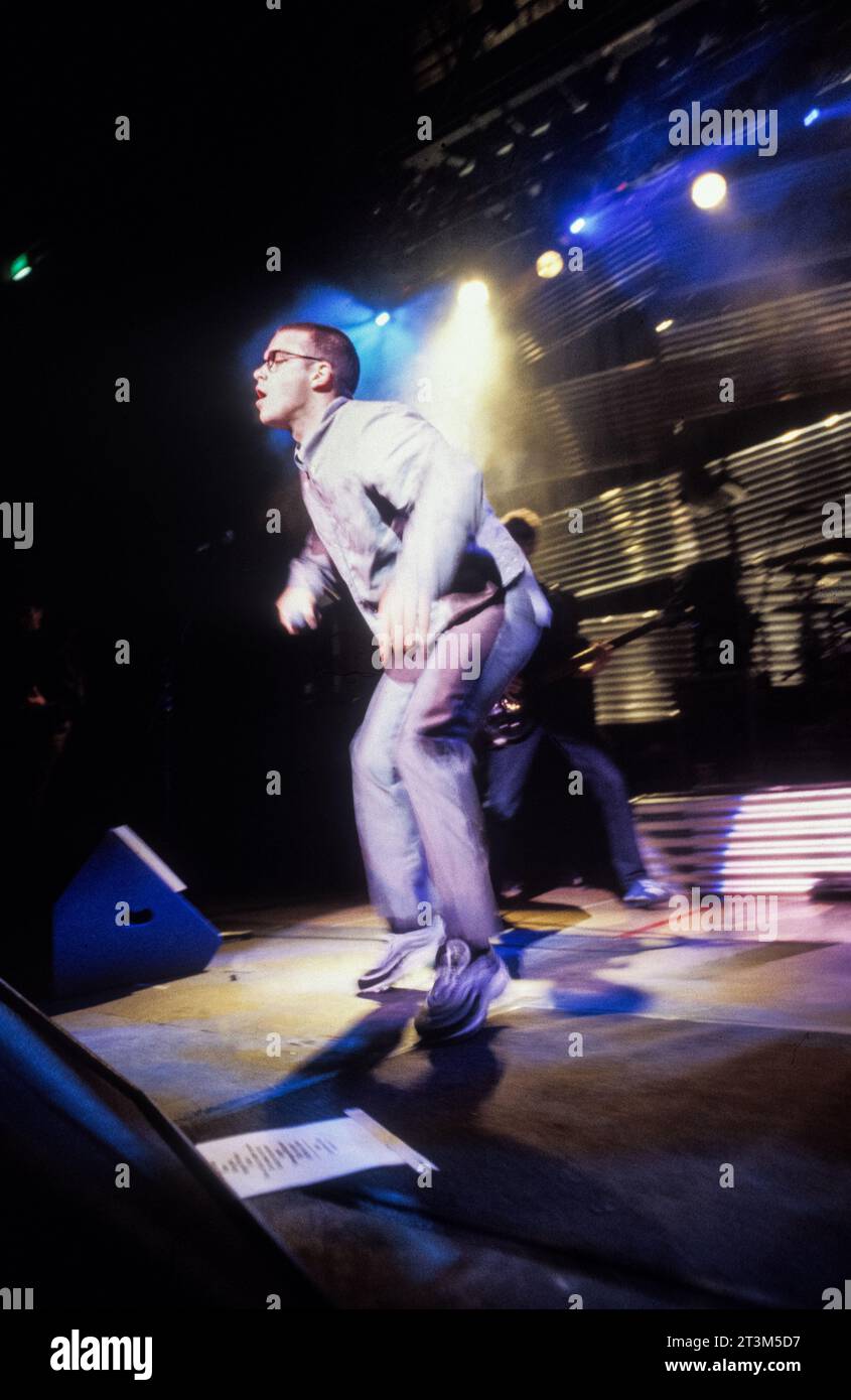 ROBBIE WILLIAMS, SINGER, FIRST TOUR, 1997: Robbie Williams playing live ...