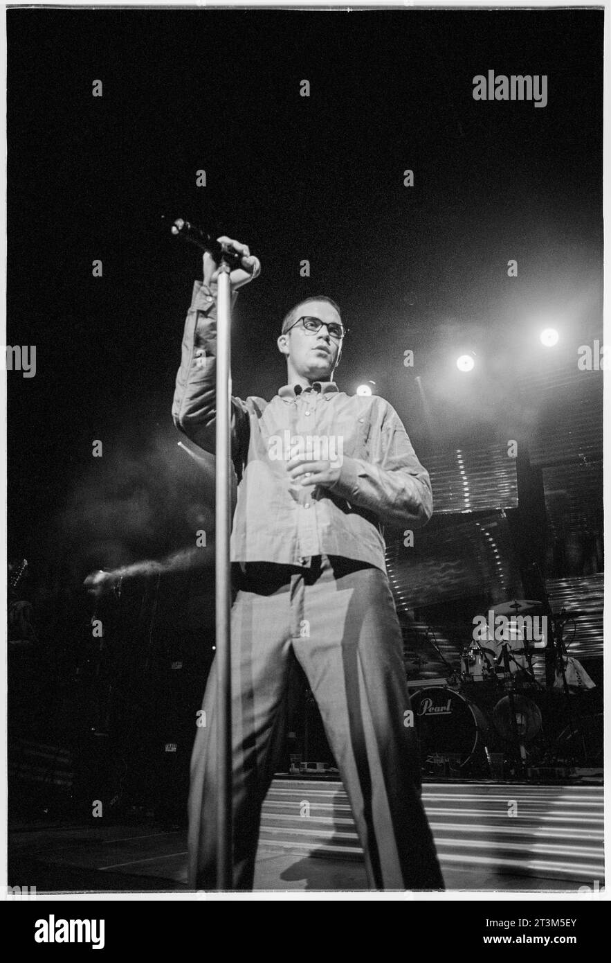 ROBBIE WILLIAMS, SINGER, FIRST TOUR, 1997: Robbie Williams playing live ...