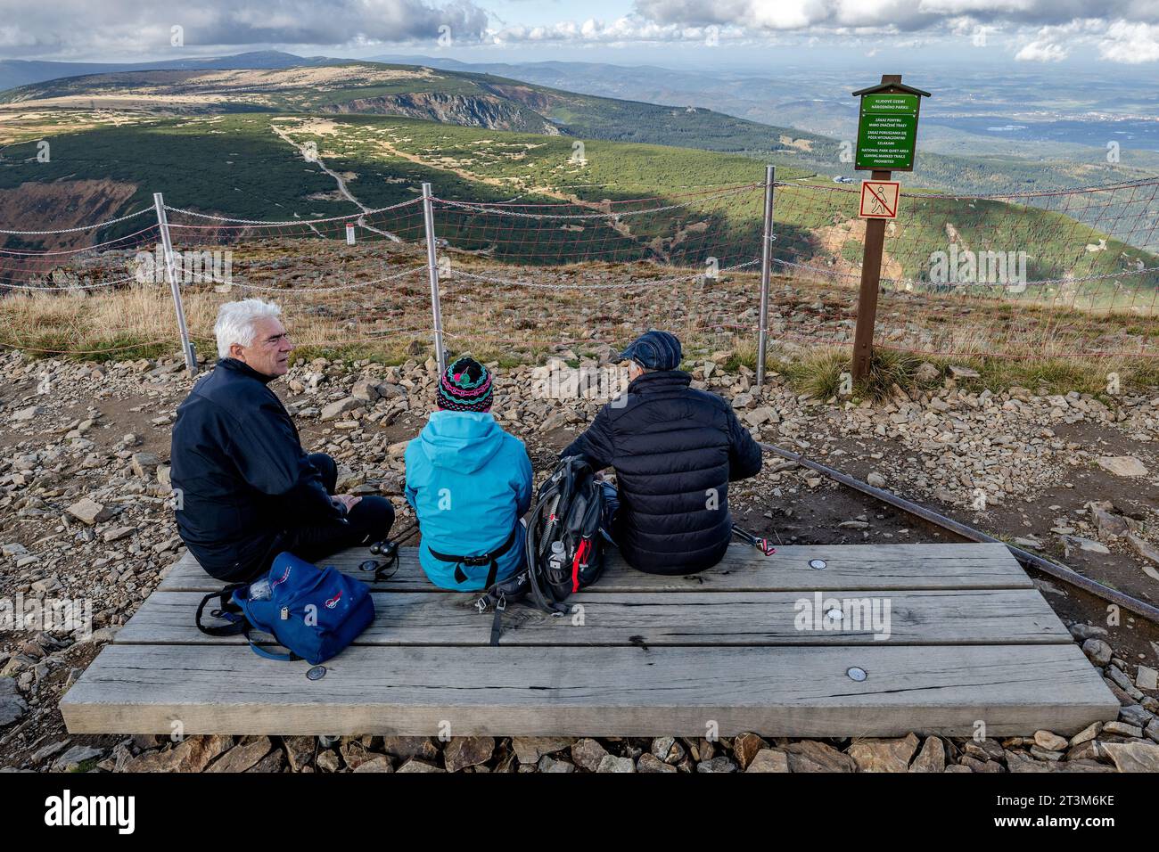 Pec Pod Snezkou, Czech Republic. 23rd Oct, 2023. Tourists sit on new ...