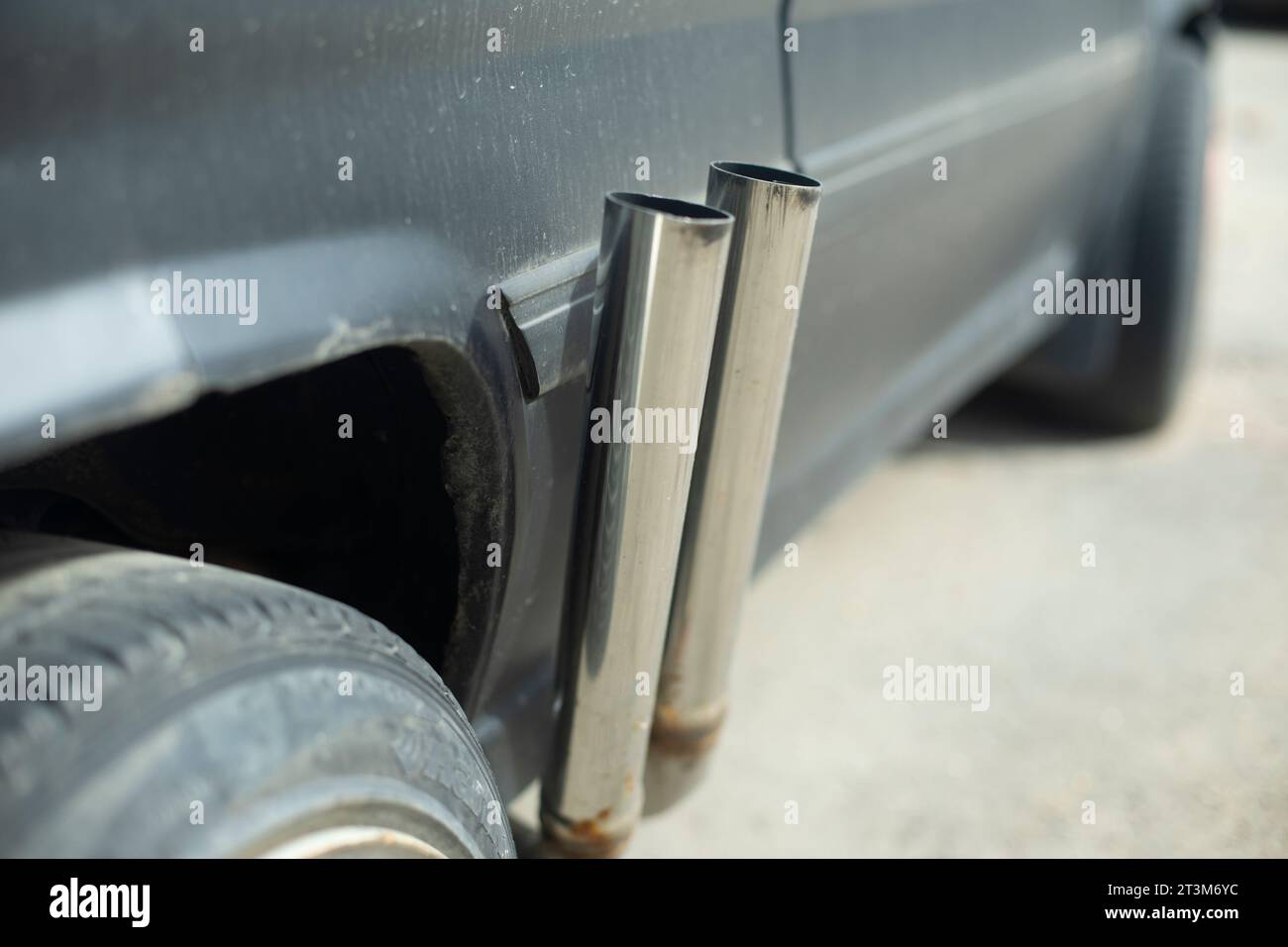 Sports car exhaust pipe. Details of sports car. Exhaust pipes ...