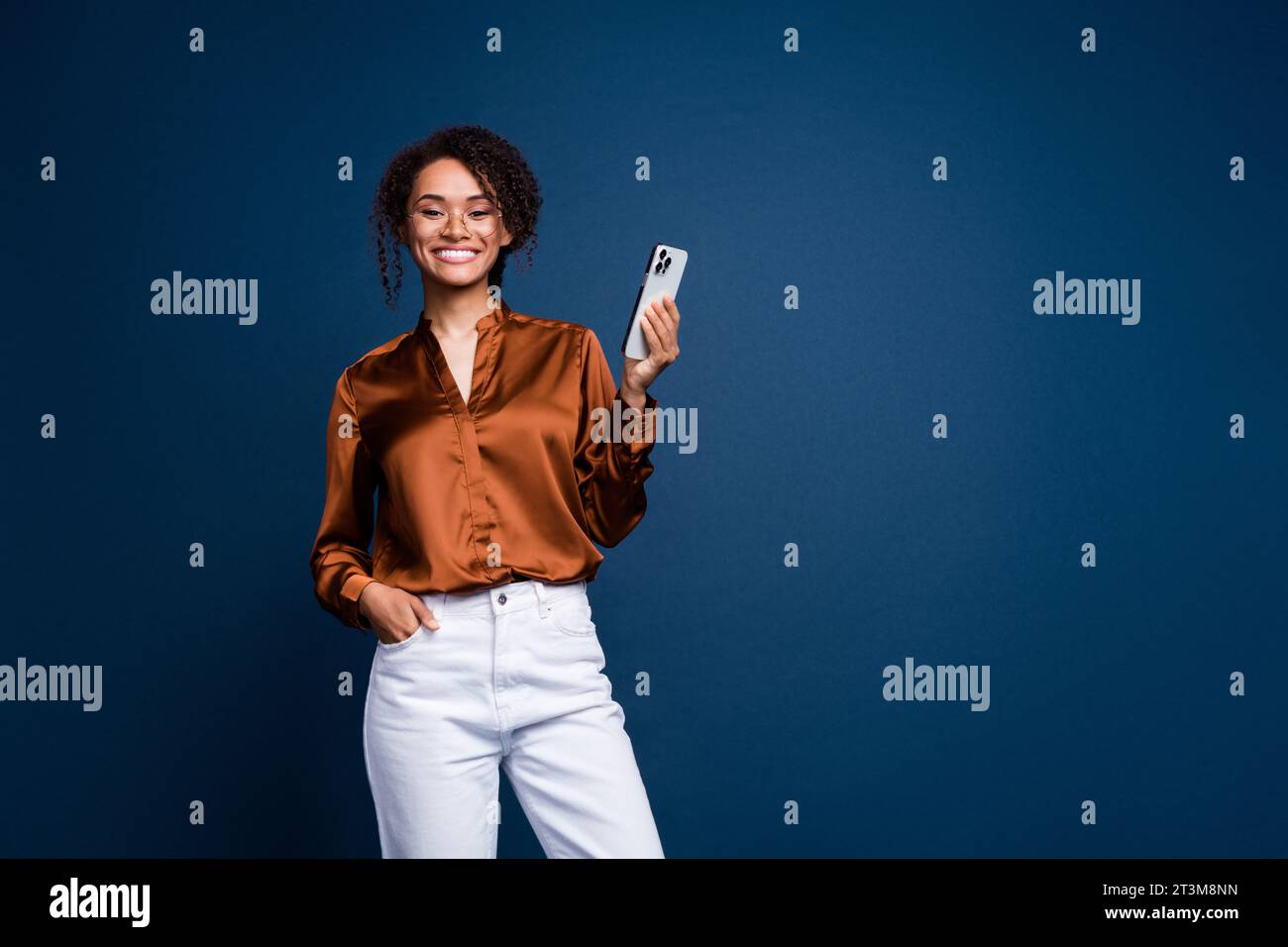 Photo of hr lady smm using phone for search job vacancy employment isolated over blue color ...