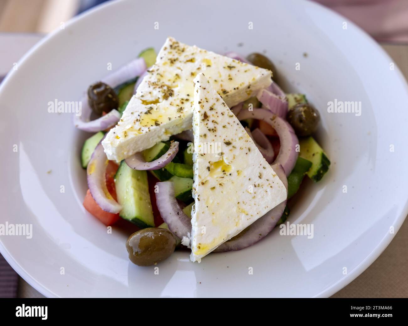 Greek salad with feta cheese. Typical delicious greek style lunch Stock ...