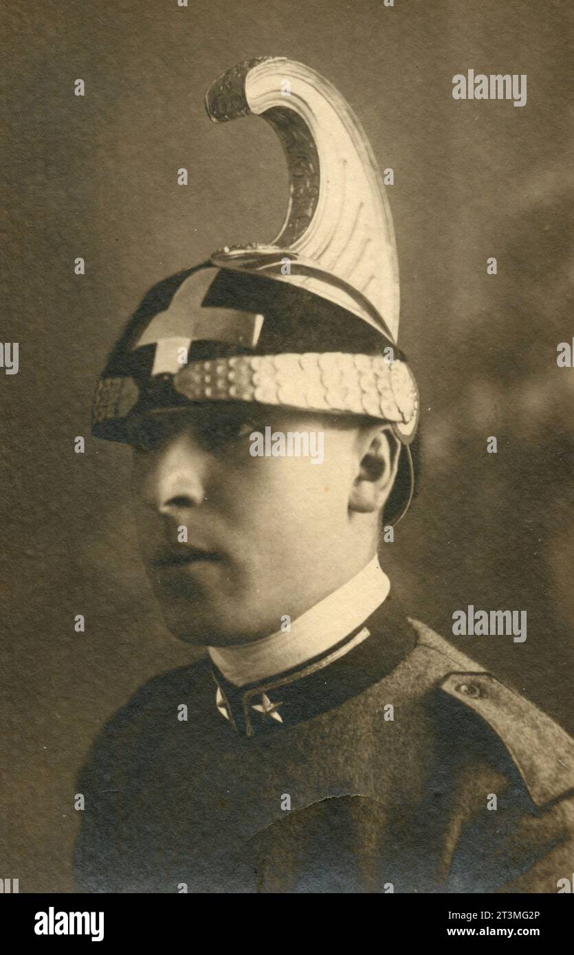 Studio portrait of a Royal Italian Army cavalry officer with helmet ...