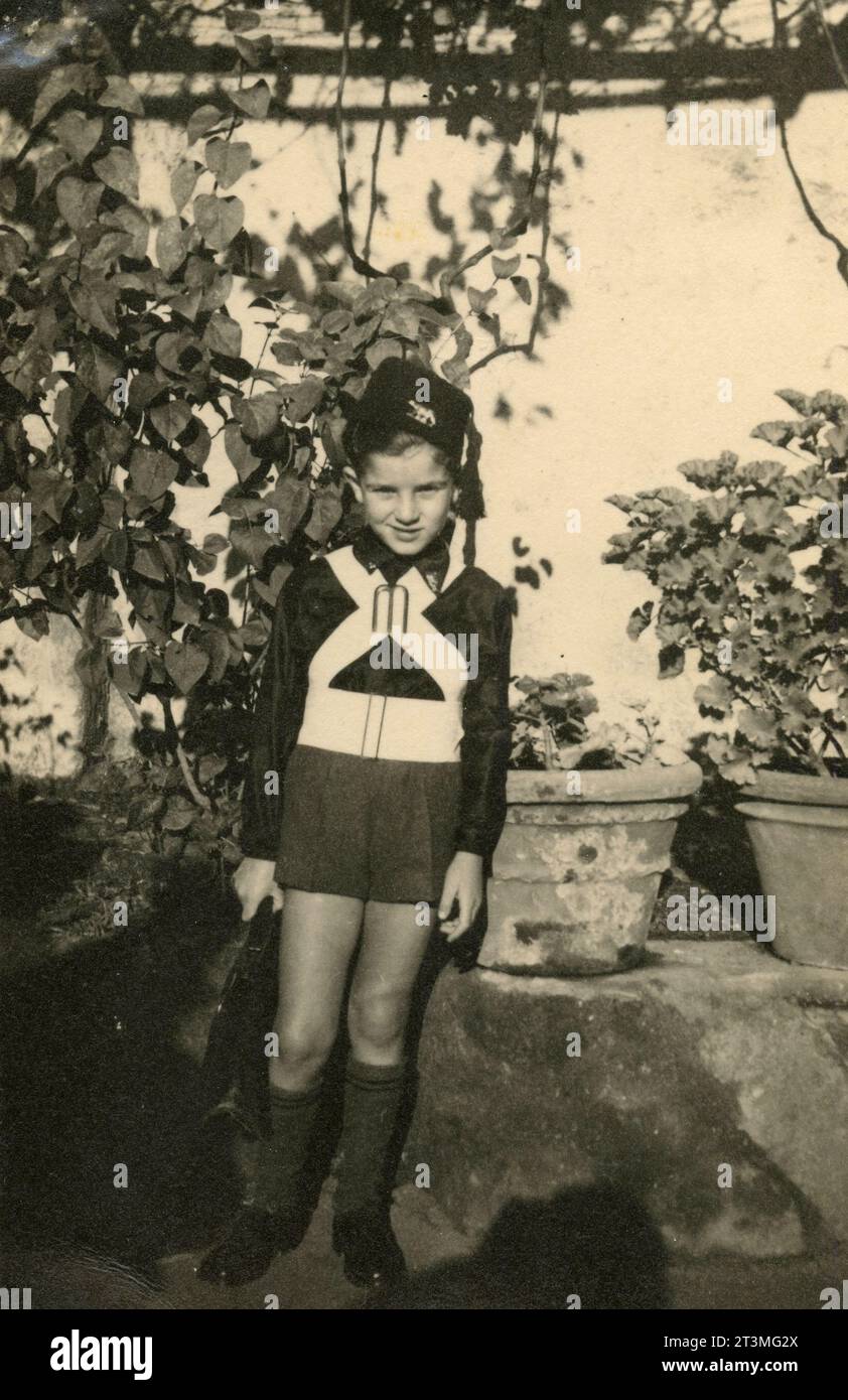 Child with the Balilla fascist uniform ready for his first school day ...